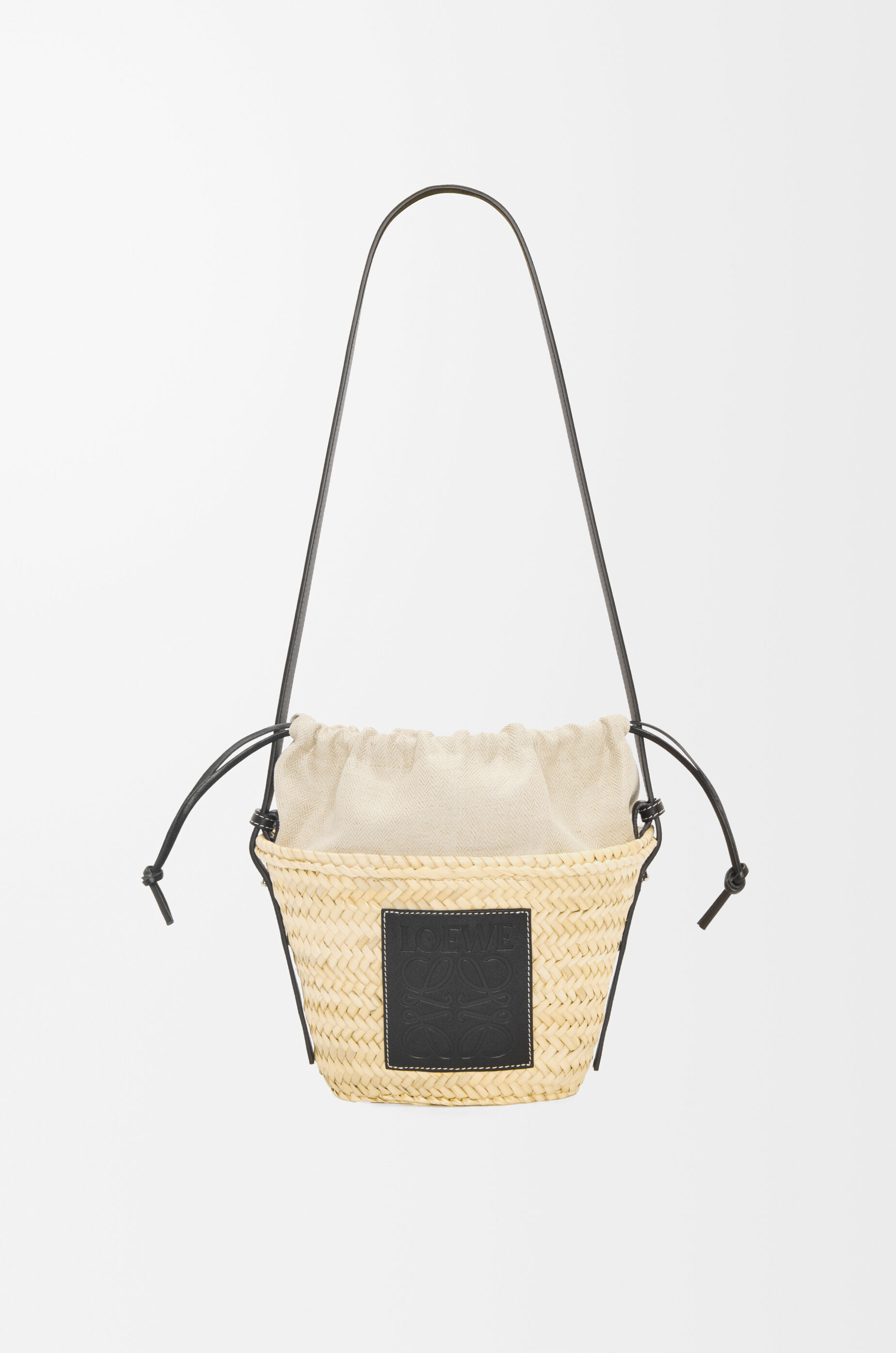 Drawstring bucket bag in palm leaf and calfskin Natural/Black - LOEWE